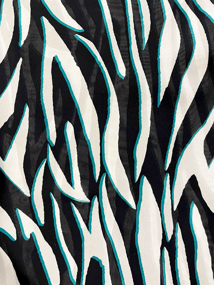 Cascade Versatile Wrap - Turquoise Zebra – Tailored West Fashion Boutique